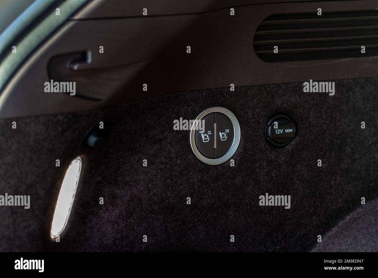 Rear seats folded. Rear seats easy fold down lever. New car inside ...