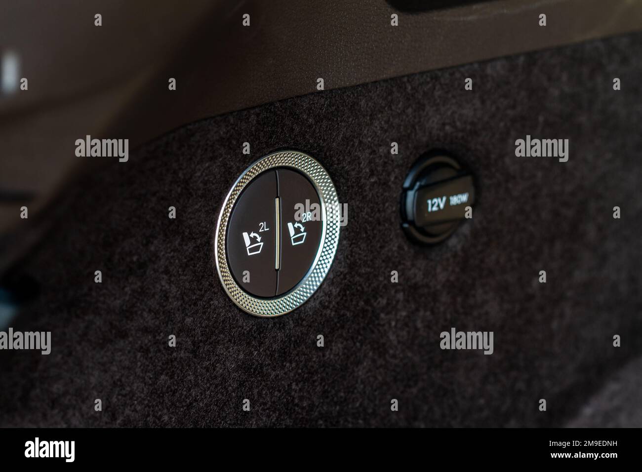 Rear seats folded. Rear seats easy fold down lever. New car inside ...