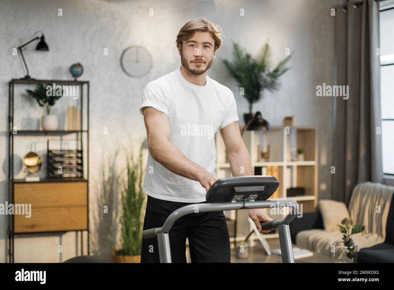 Man treadmill home hi-res stock photography and images - Alamy