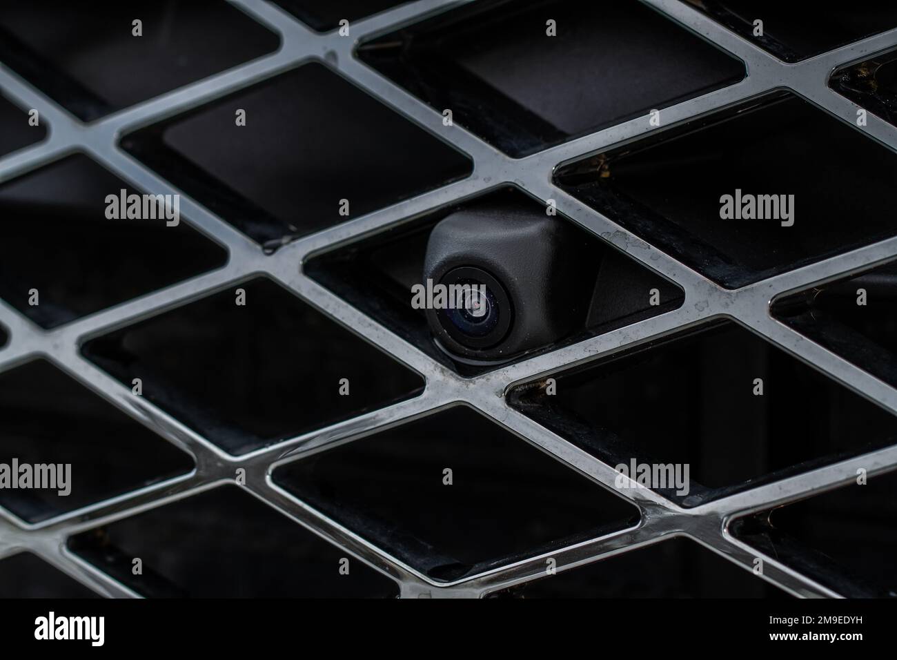 Close up view of front parking assist video camera on the car. Front ...