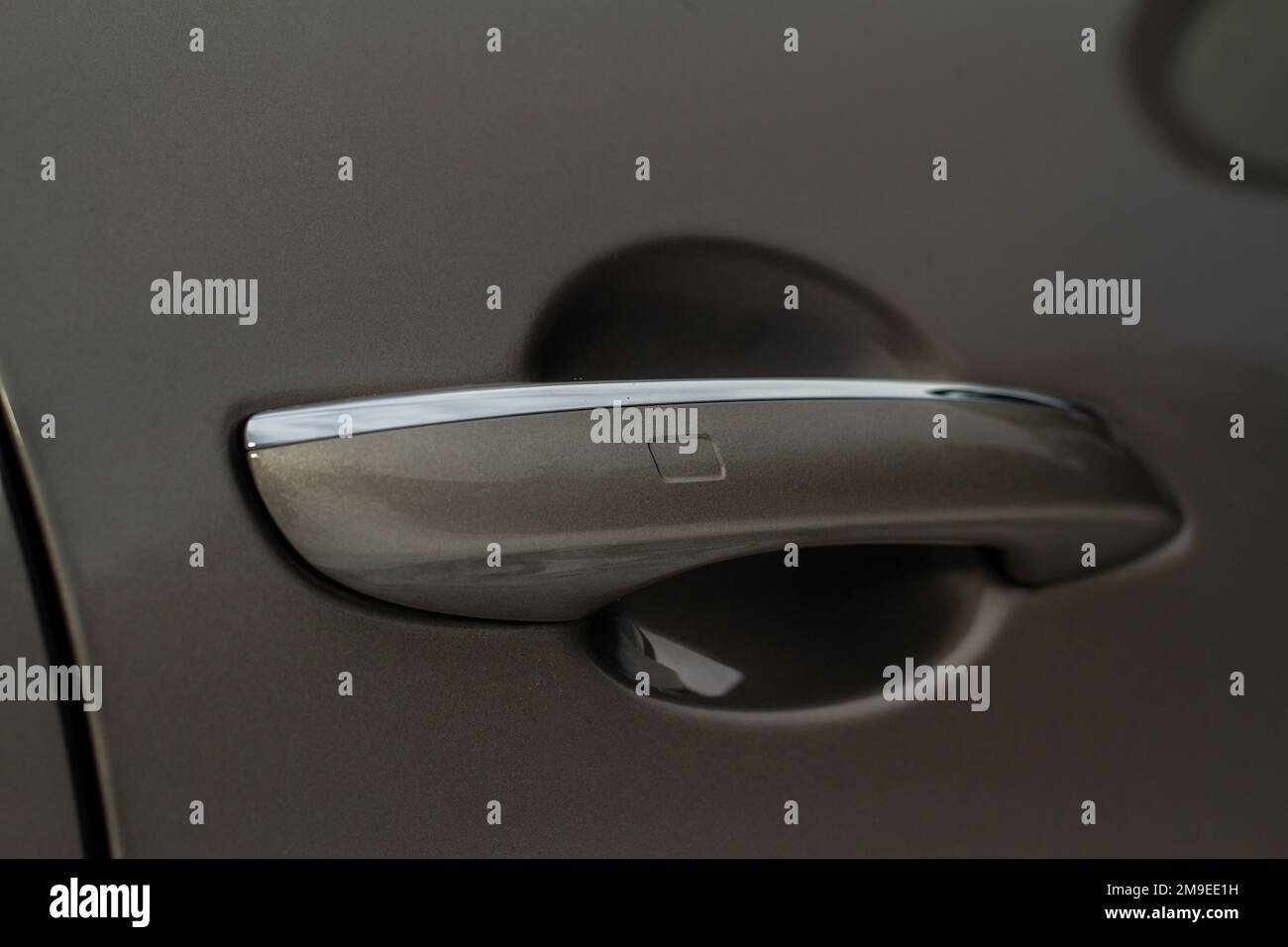 Close up of car door handle. Keyless entry system with touch sensor ...