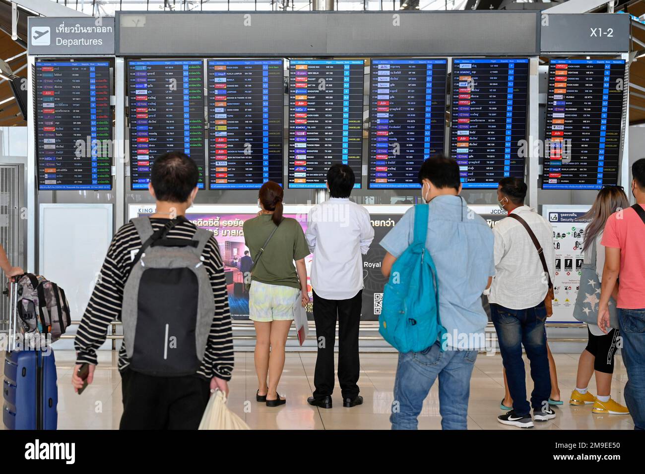 Display board flight connections departures, passengers, Bangkok ...