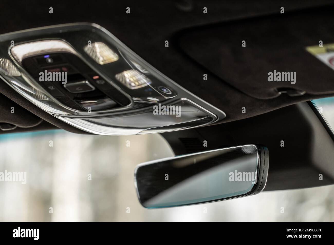 Modern car interior close up view with metallic and plastic details ...