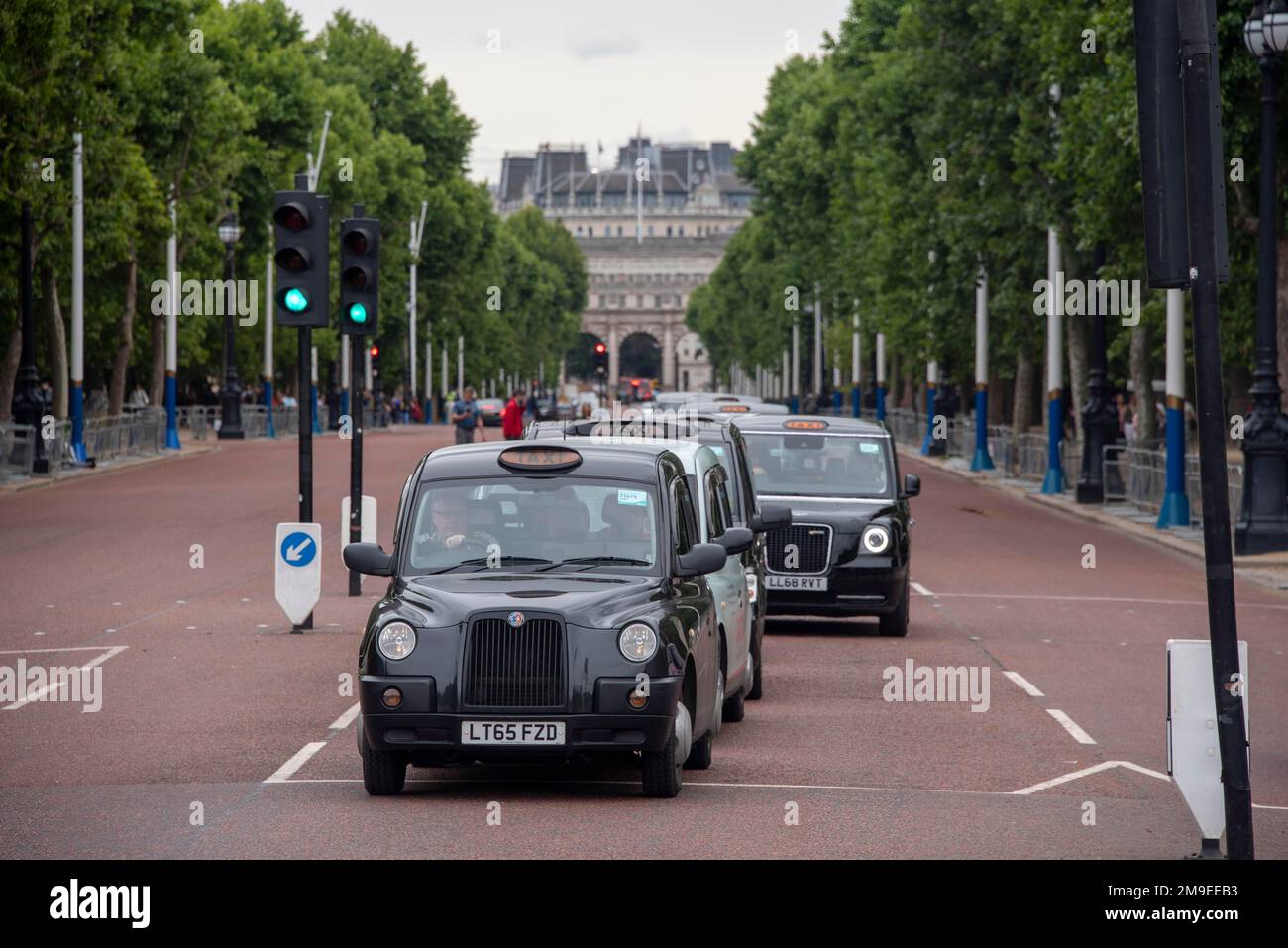 London taxis on The Mall, London, England, United Kingdom Stock Photo ...