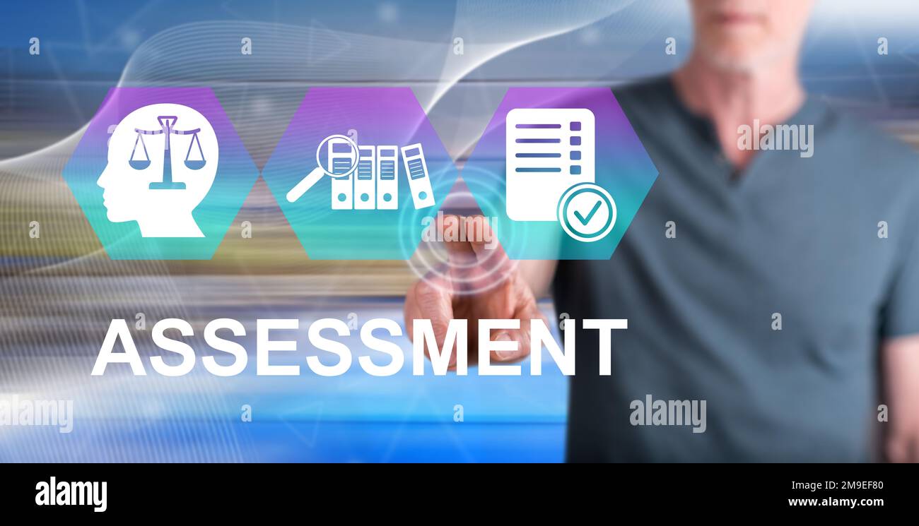Man touching an assessment concept on a touch screen with his finger ...