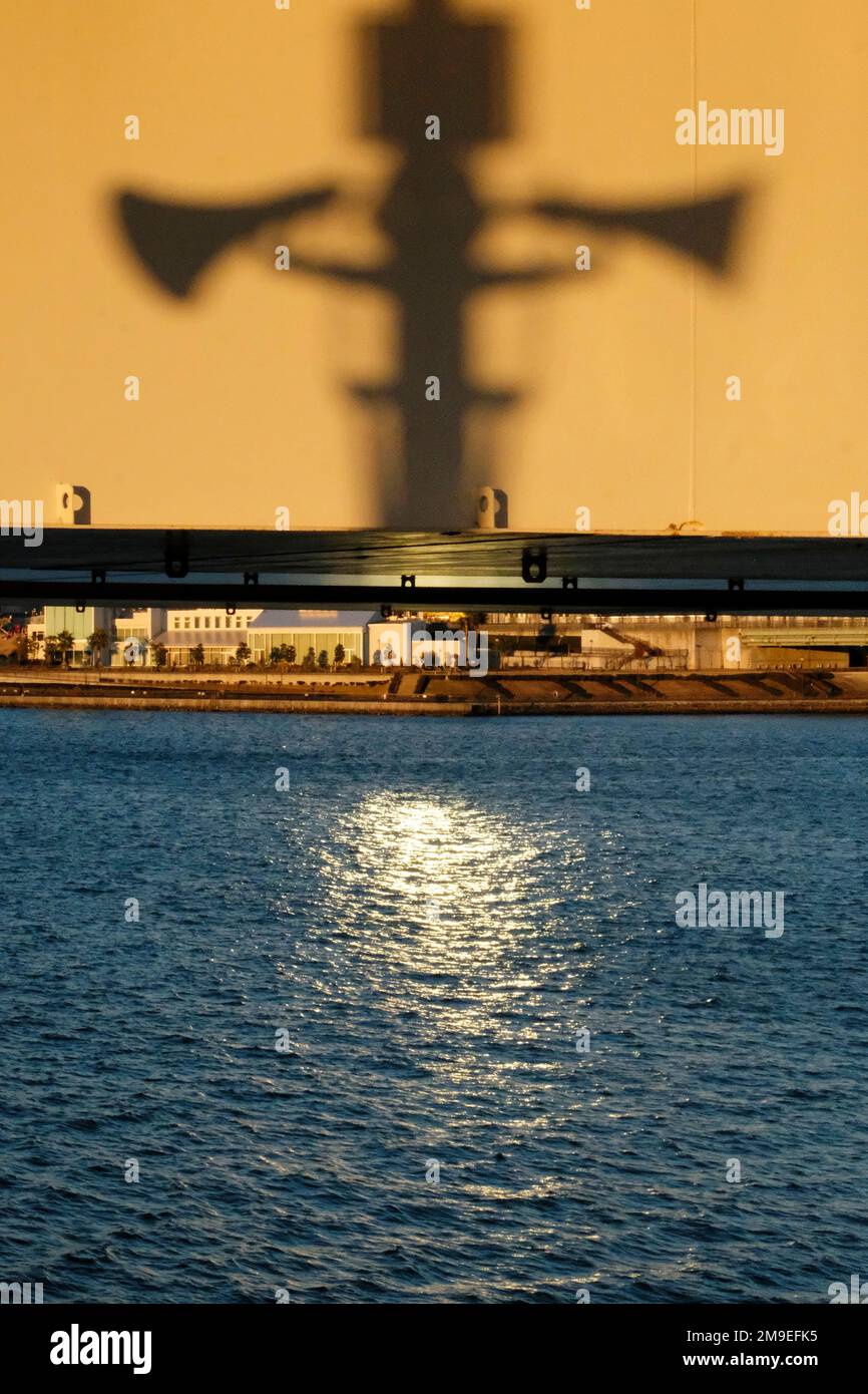 Sunlight and shadows on the Rainbow Bridge in Tokyo, Japan, in the ...