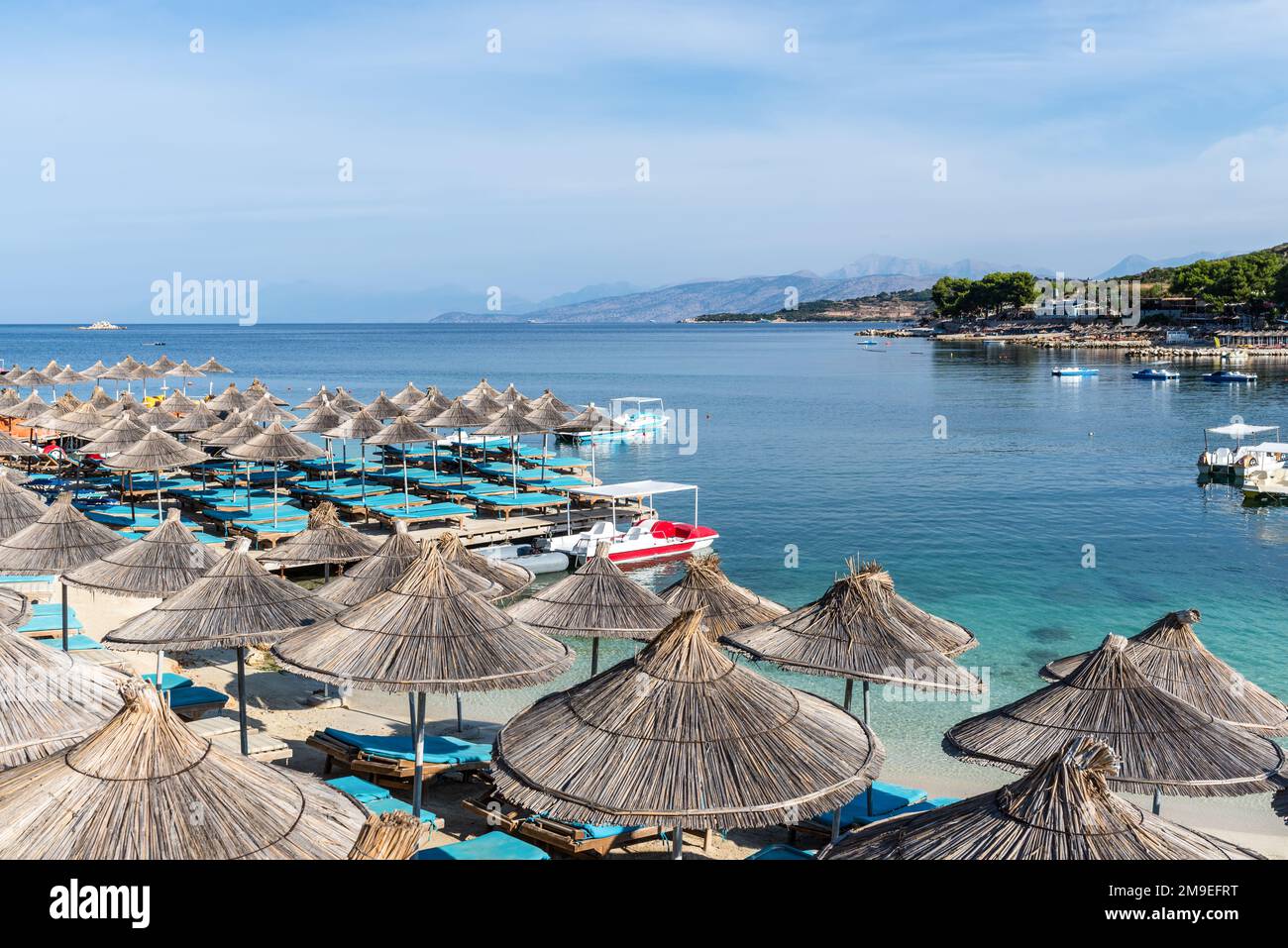 Ksamil, Albania - September 11, 2021: Umbrellas in rows on the Poda ...