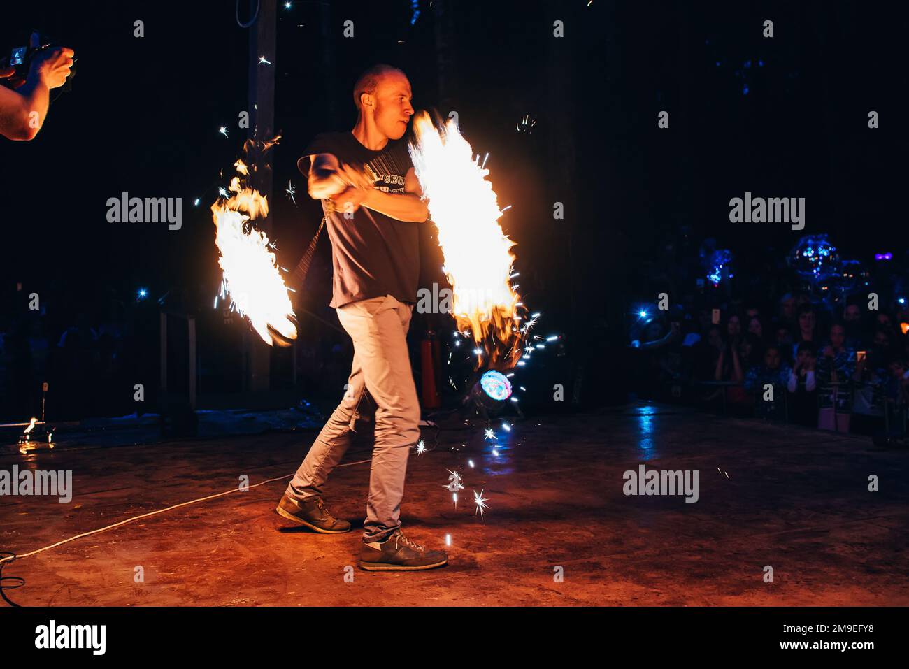 Group of people with torches hi-res stock photography and images - Alamy