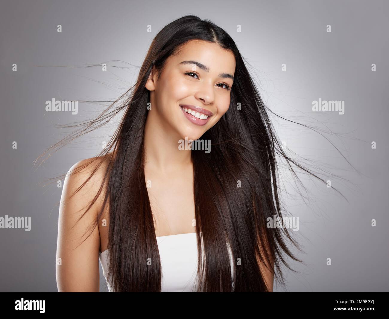 My hair looks too good to stay in today. Studio portrait of an ...
