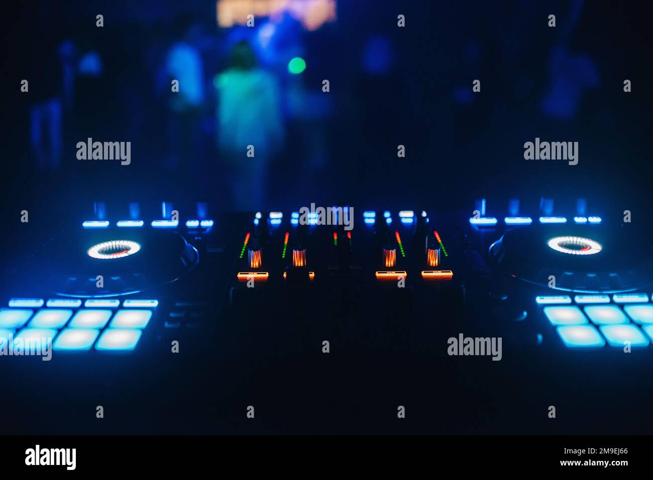 DJ mixer controller panel for electronic music in night club Stock ...