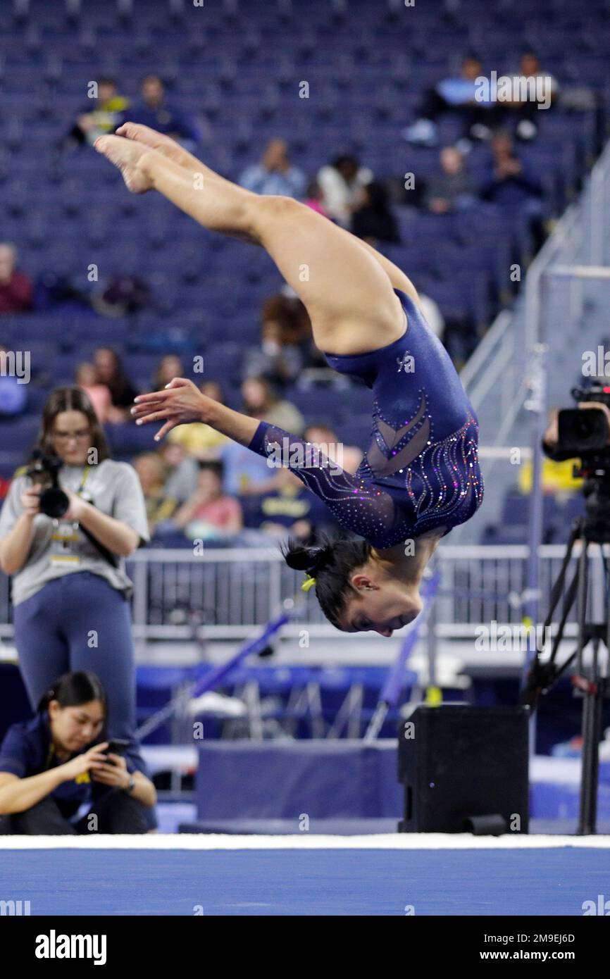 Michigan's Reyna Guggino competes in the floor during an NCAA ...