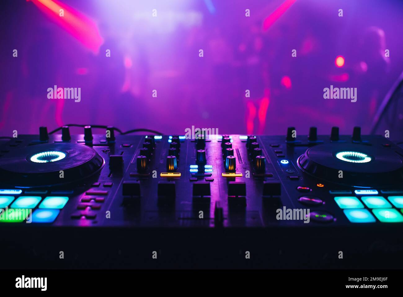 DJ mixer for mixing music and sound in a nightclub at a party Stock ...