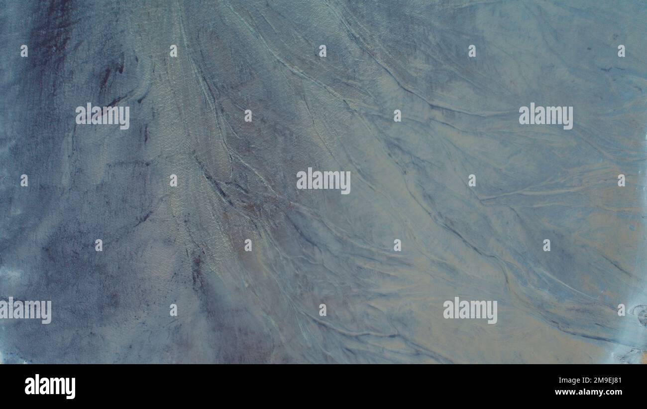 Top down aerial view over natural texture - abstract industrial lake ...