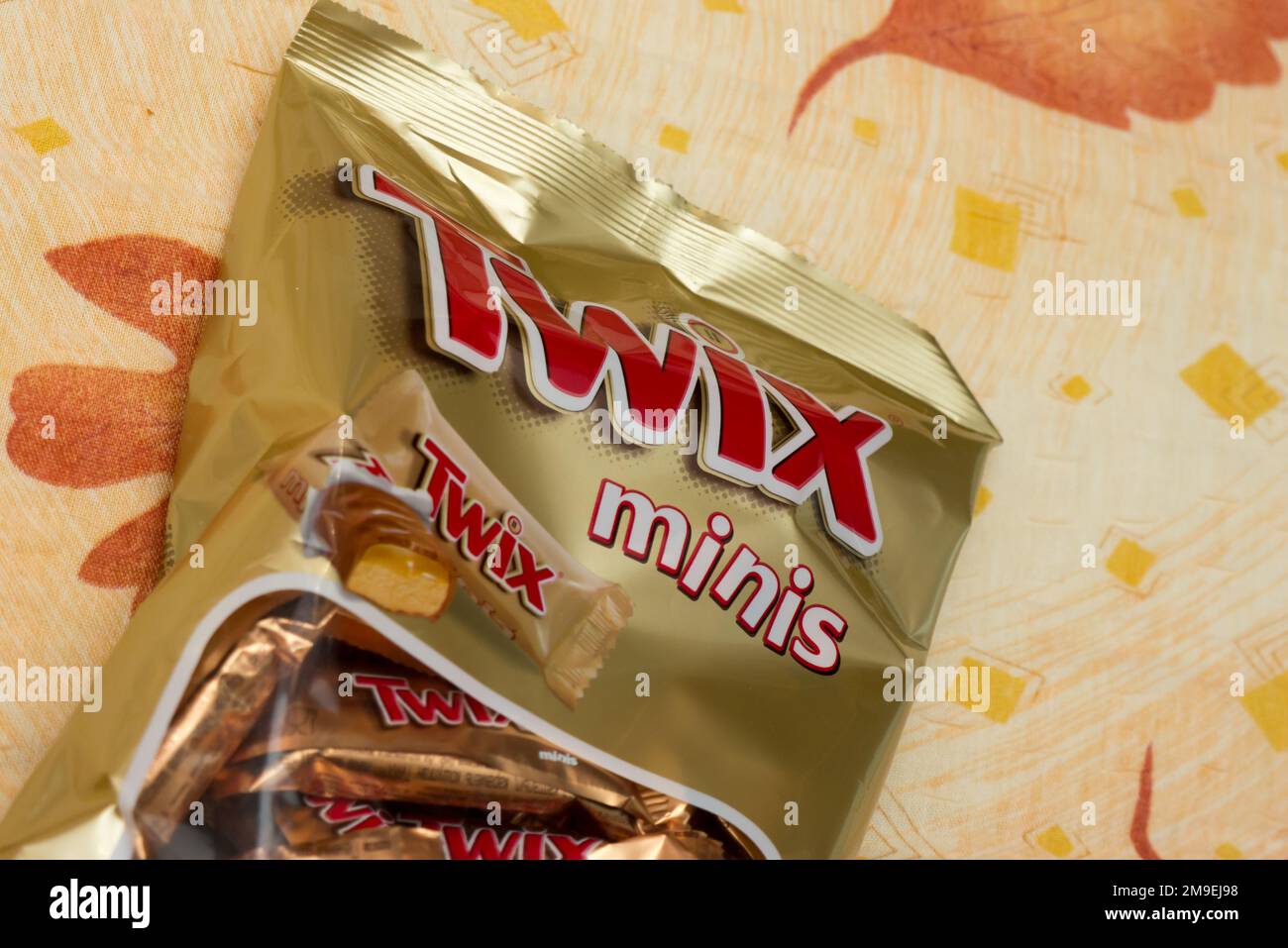 Twix minis cookie bars on yellow background.Twix is a chocolate bar ...