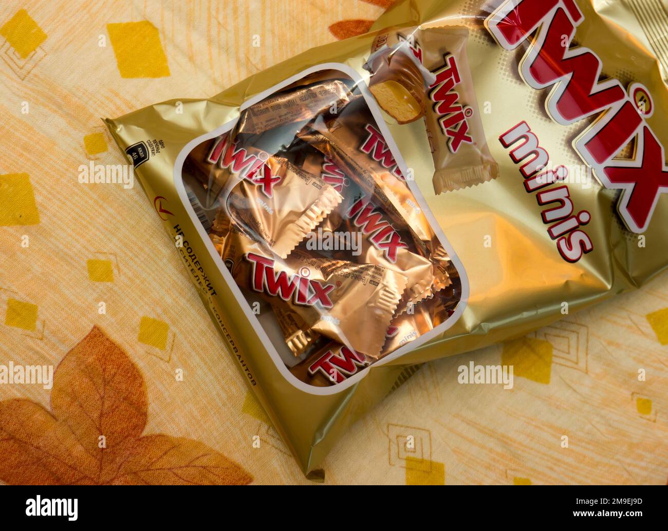 Twix minis cookie bars on yellow background.Twix is a chocolate bar ...