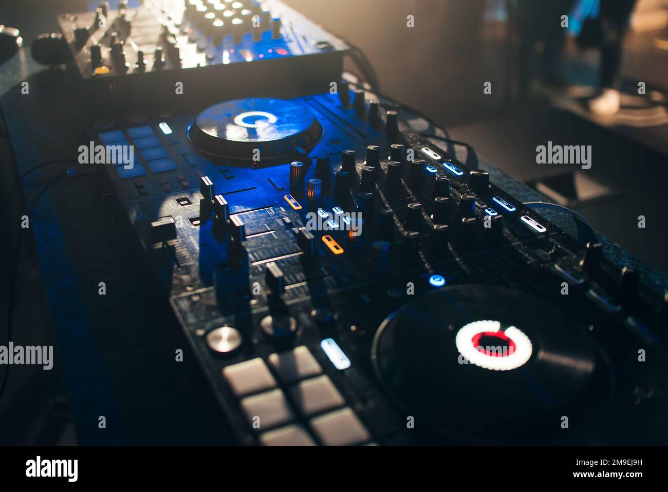 DJ mixer controller panel for electronic music in night club Stock ...