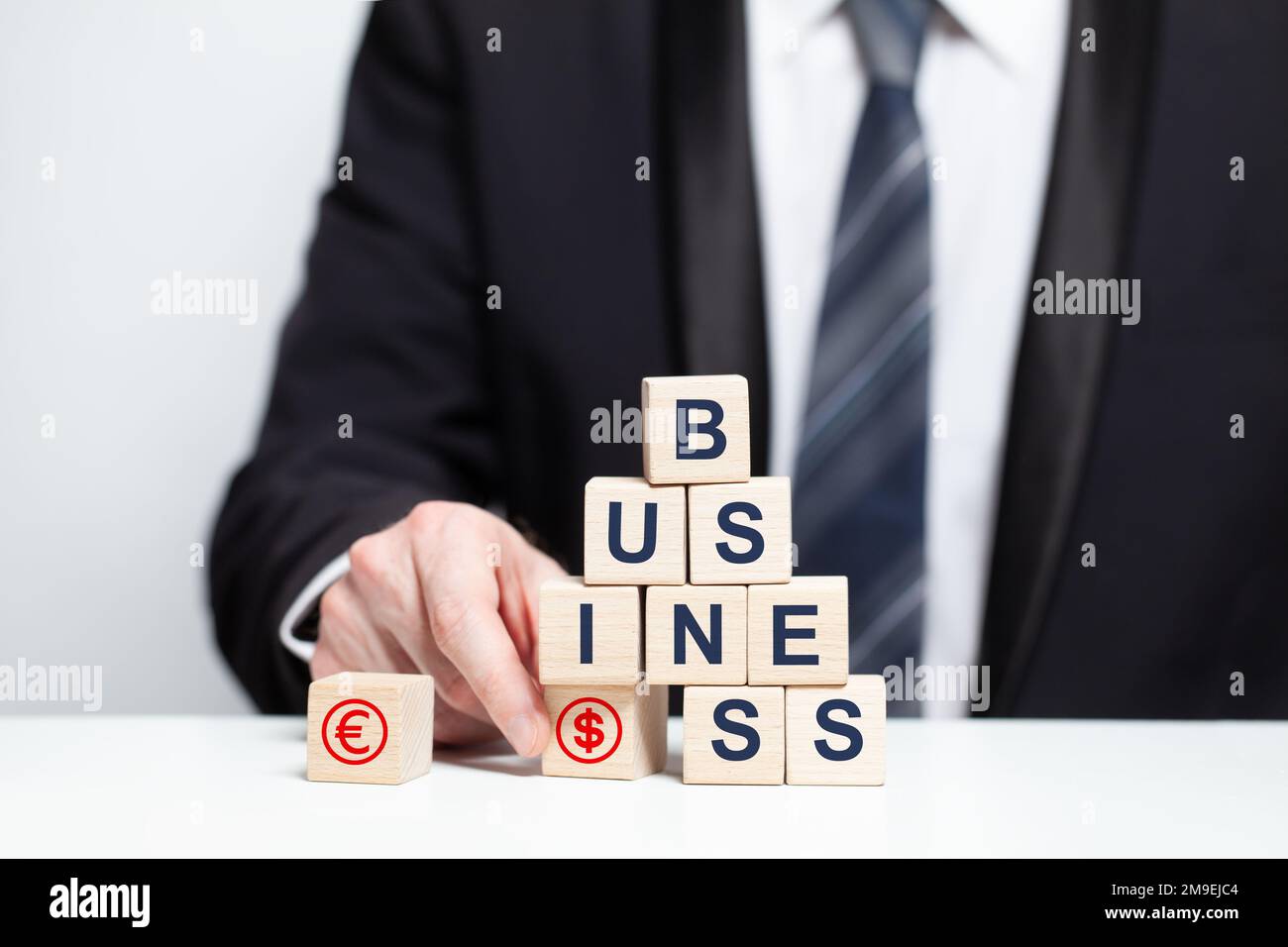Wooden cubes with word business, business growth success goal concept ...