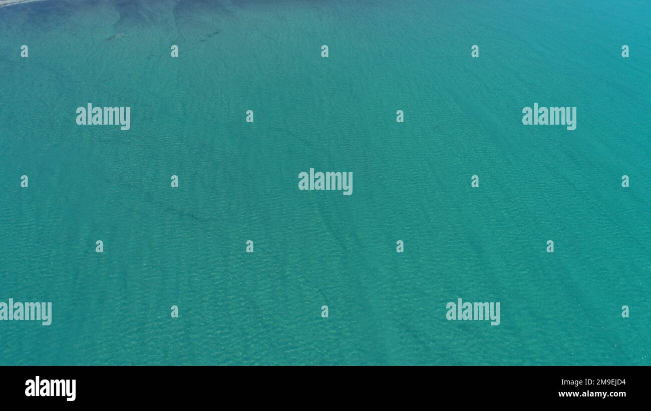 Top down aerial view over natural texture - abstract industrial lake ...