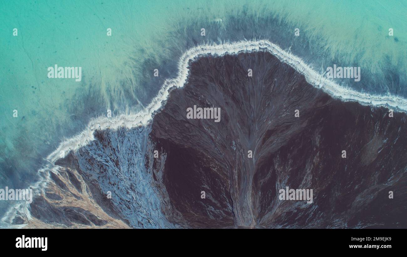 Top down aerial view over natural texture - abstract industrial lake ...