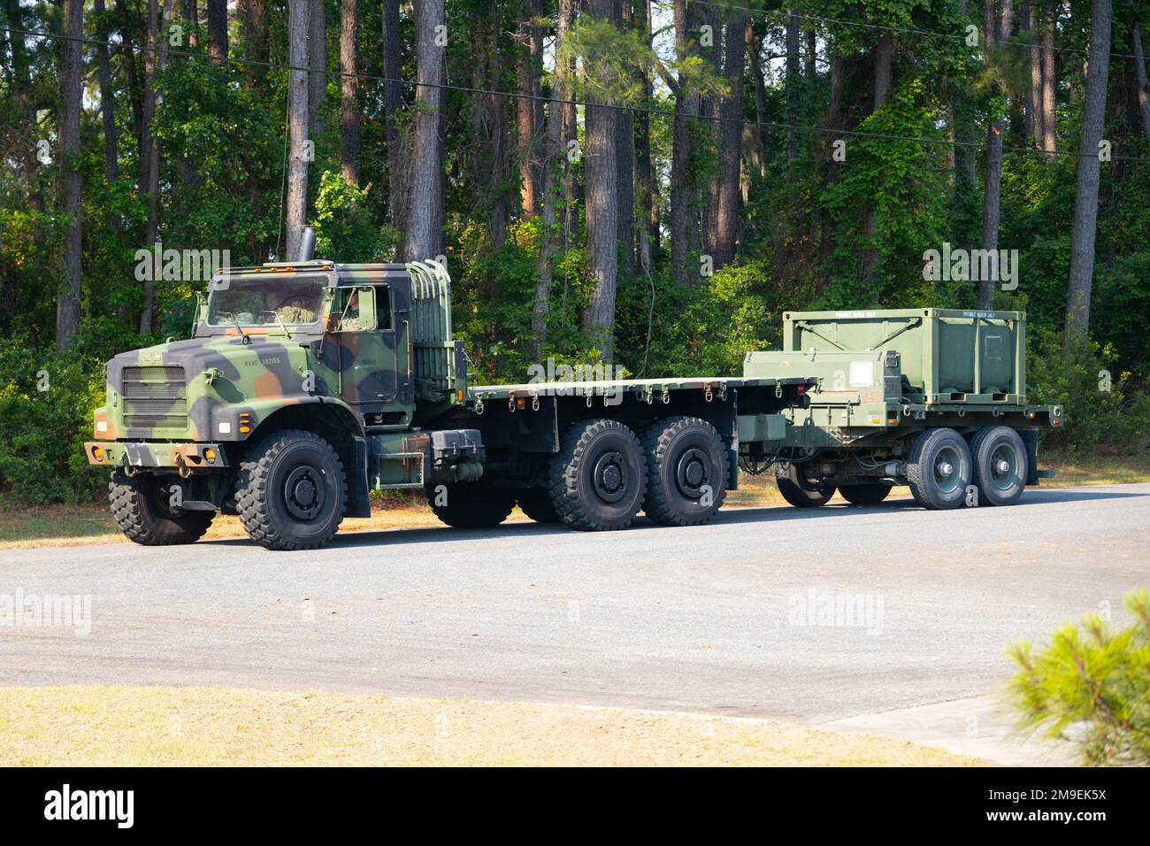 A U.S. Marine Corps 7-ton pulls fresh drinking water during Exercise ...