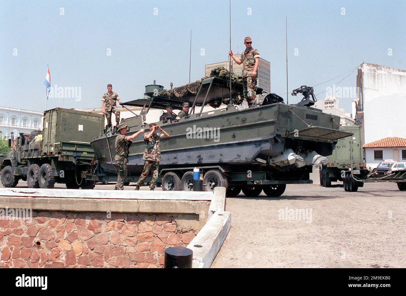 Marines from Small Craft Company prepare a Riverine Assult Craft, being ...