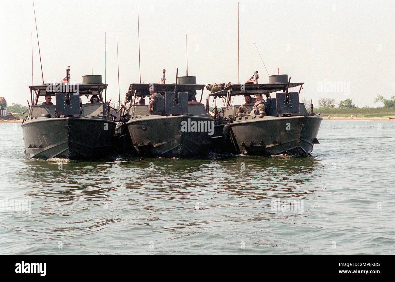 Marines from Small Craft Company lash their Riverine Assault Crafts ...