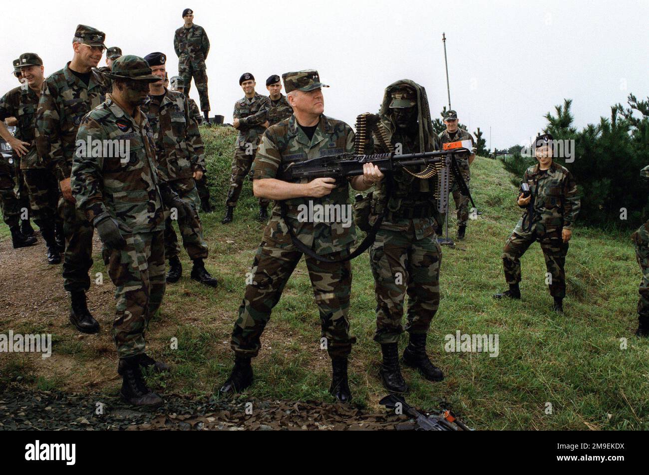 Judge Advocate General of the Air Force, MGEN William Moorman, fires an ...