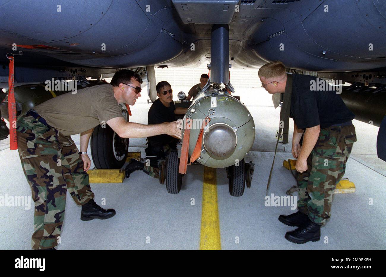 Members of the 18th Wing, Kadena Air Base, Japan, conduct BLU-97/B ...