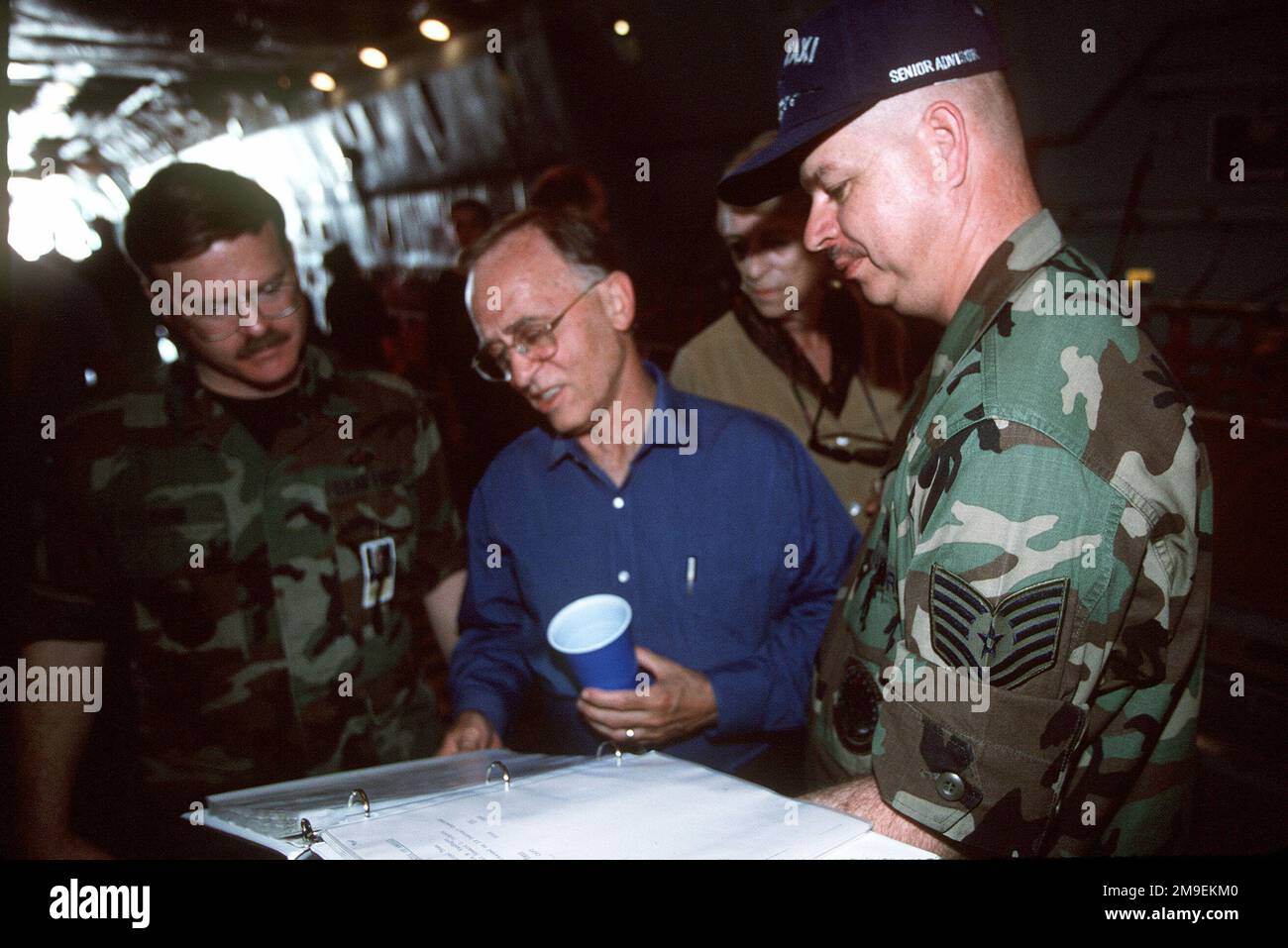 US Air Force Technical Sergeant Henry Harlow shows retired US Air Force ...