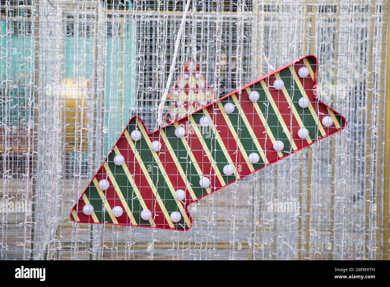 Christmas decoration, arrow with lights, outdoor Stock Photo - Alamy