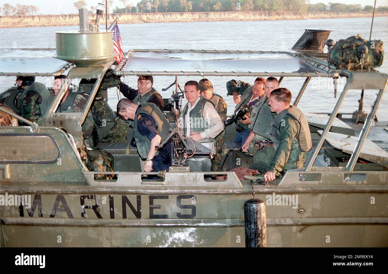 Marines from Small Craft Company, in a Riverine Assault Craft, return ...