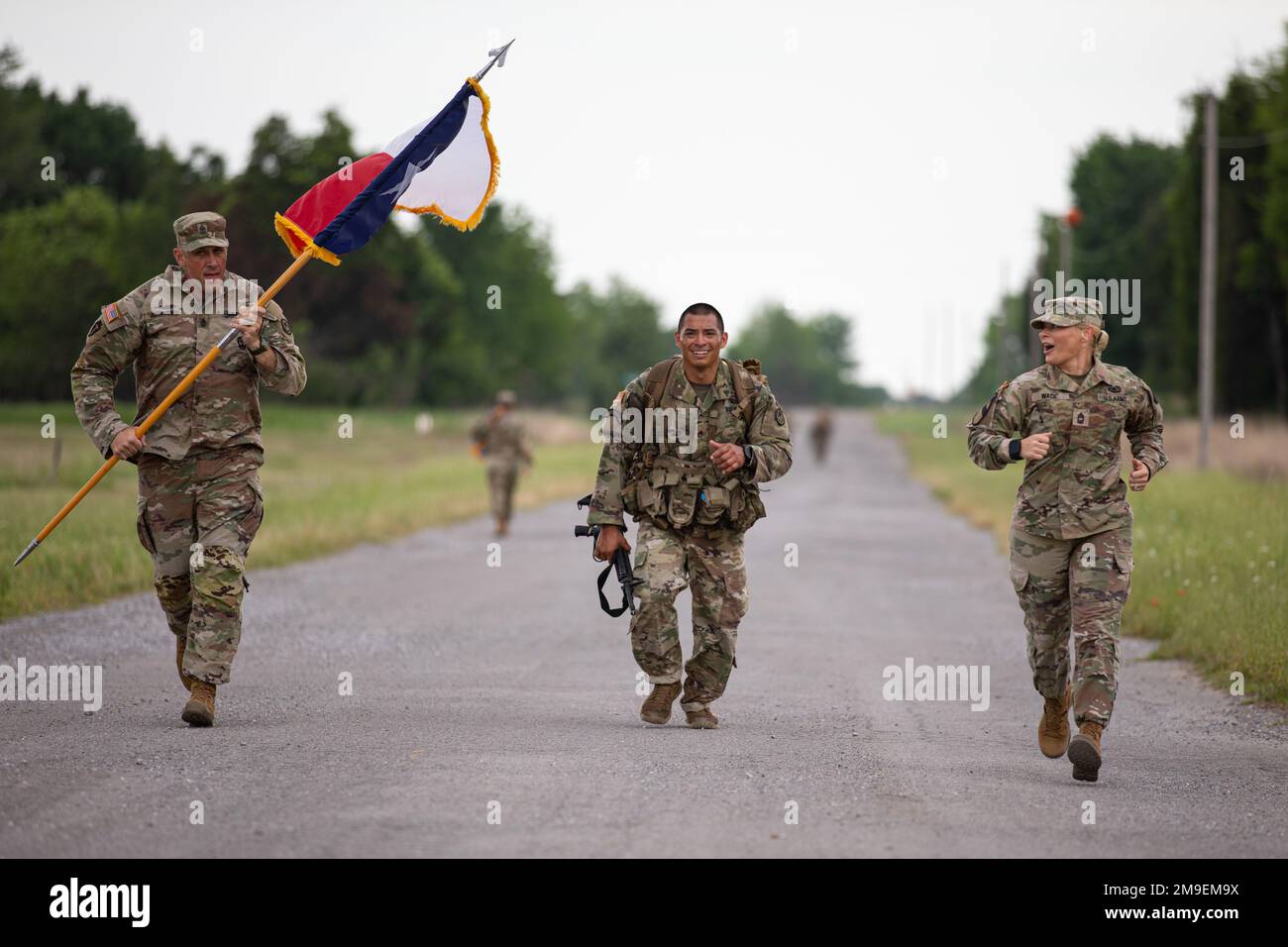 Staff Sgt. Eric Rodriguez, a Soldier of the Texas National Guard, runs ...