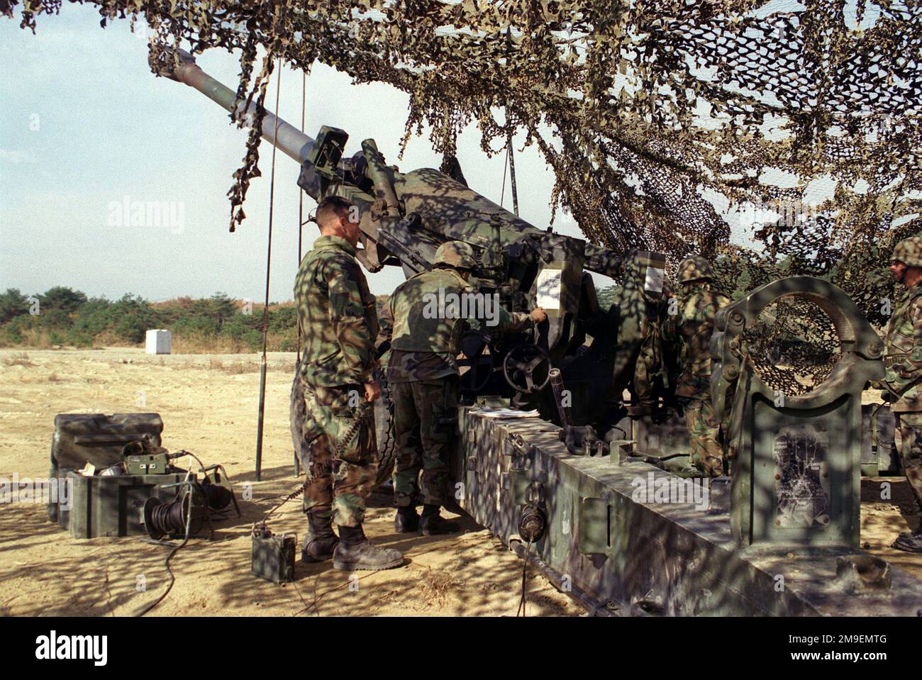 Left side rear view medium shot of a US Marine M198 155mm Howitzer as ...