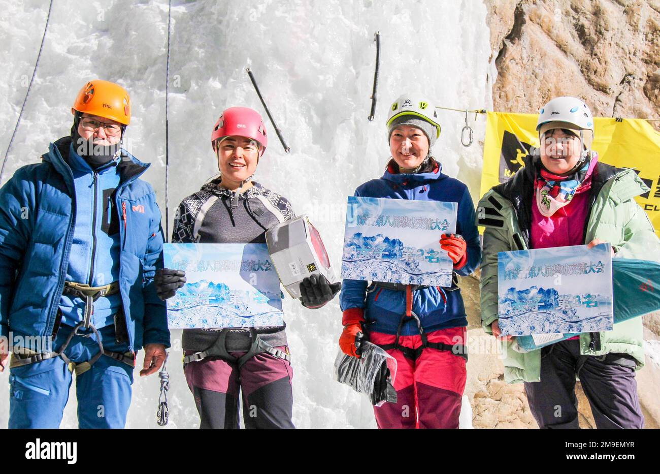 The winners of the women's group take a group photo at the 8th Ice ...