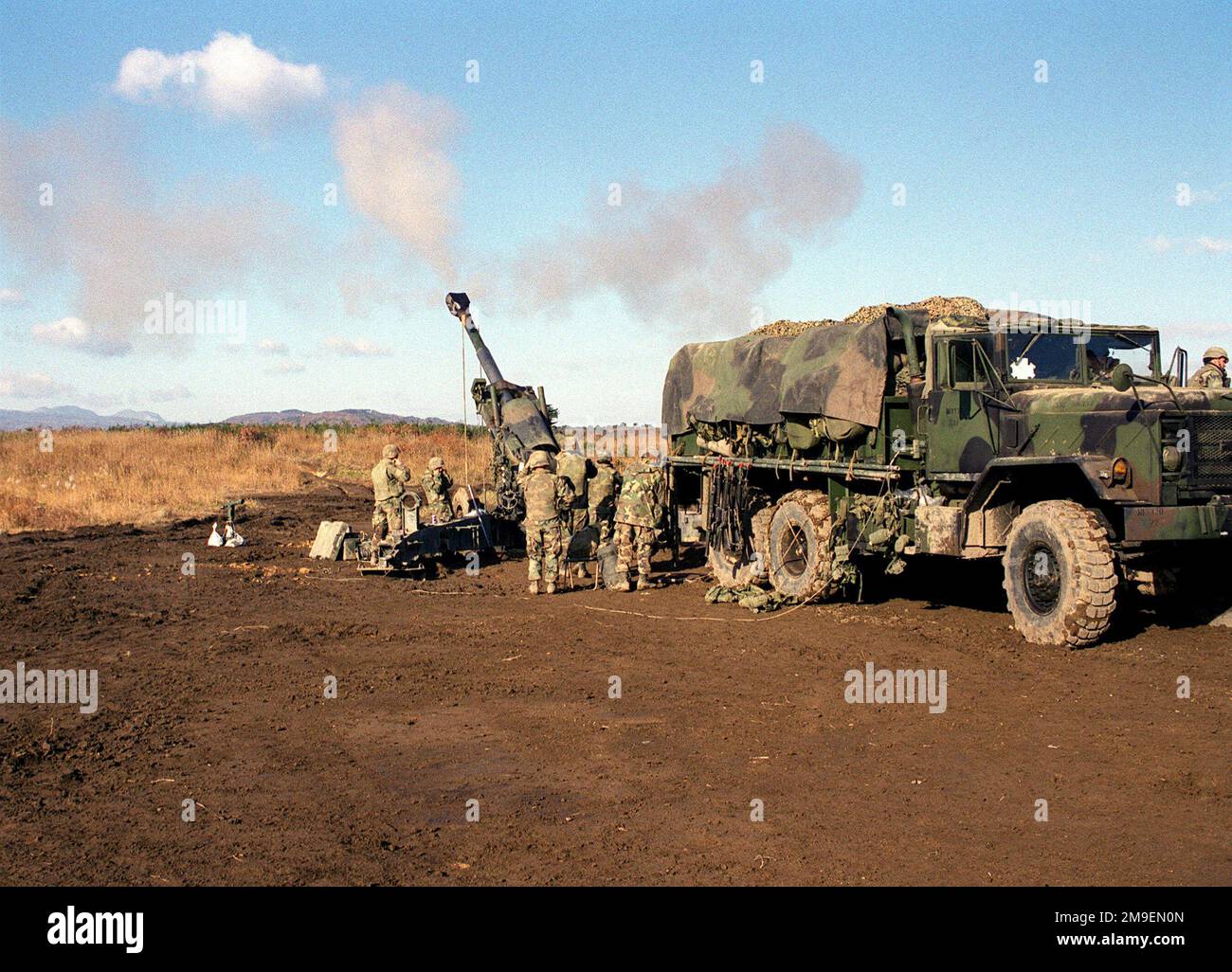 Straight on medium shot of US Marine Cannoneer from Lima Company, 3rd ...