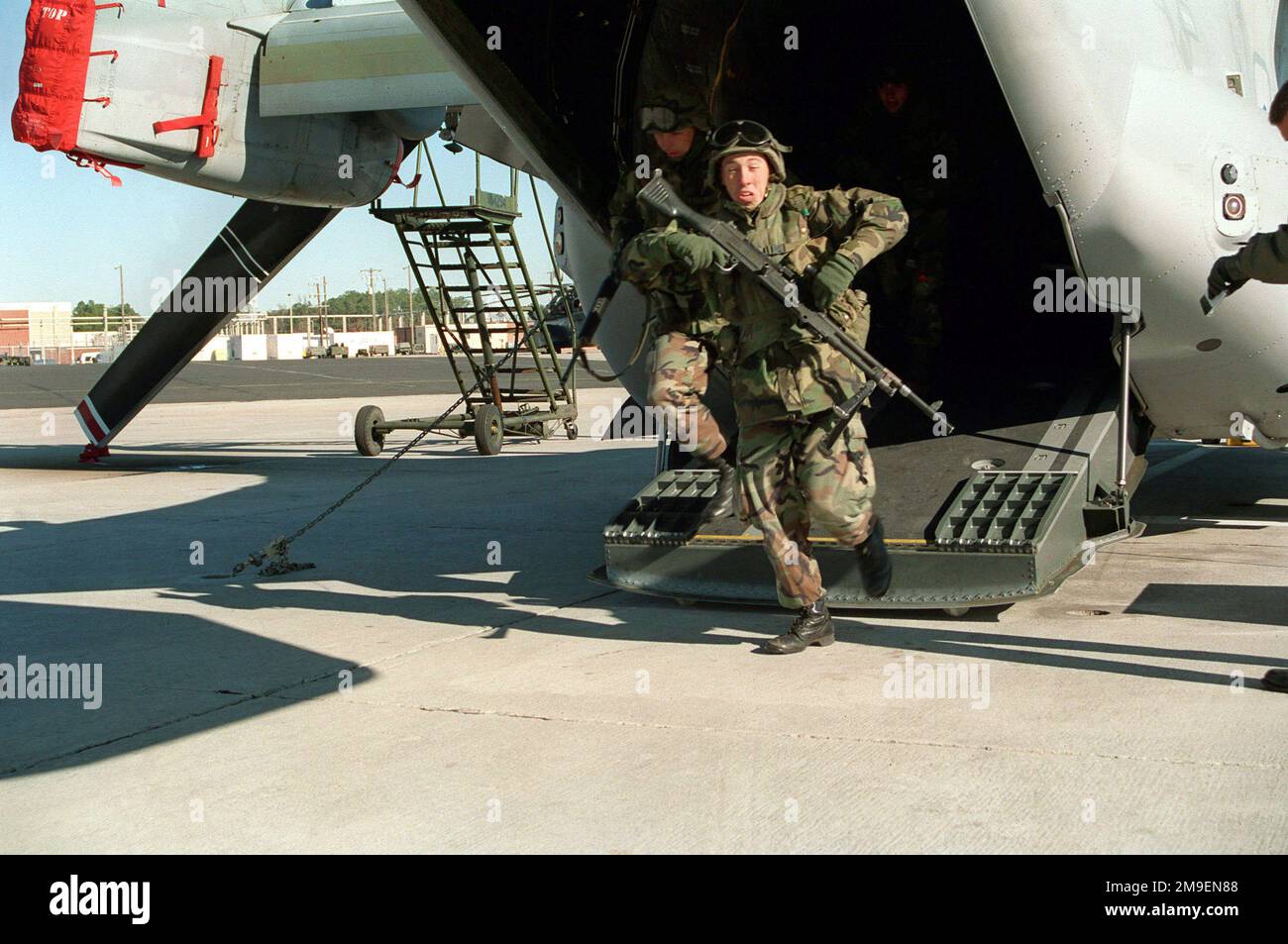 Right side rear view medium shot of US Marines from Bravo Company, 8th ...