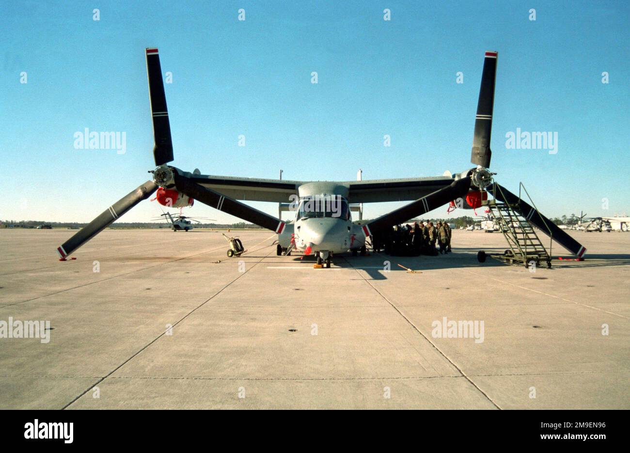 Straight on front view medium shot of a US Marine MV-22 Osprey tilt ...