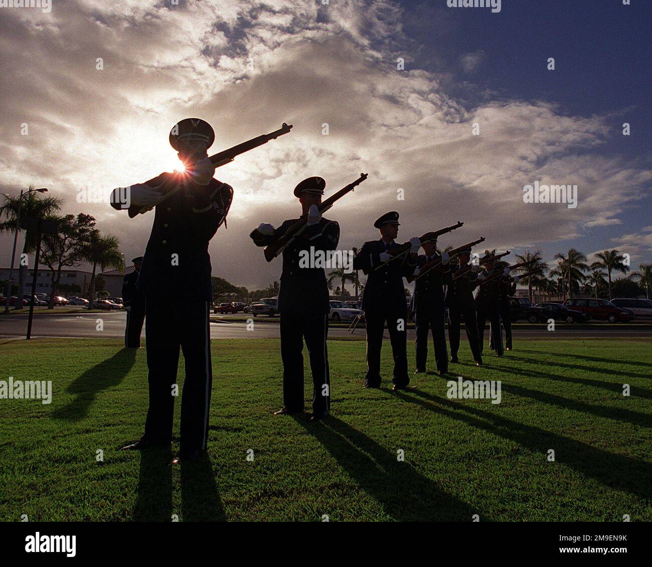 Hickam AIr Force Base, Hawaii, honor guard perform a 21 gun salute ...