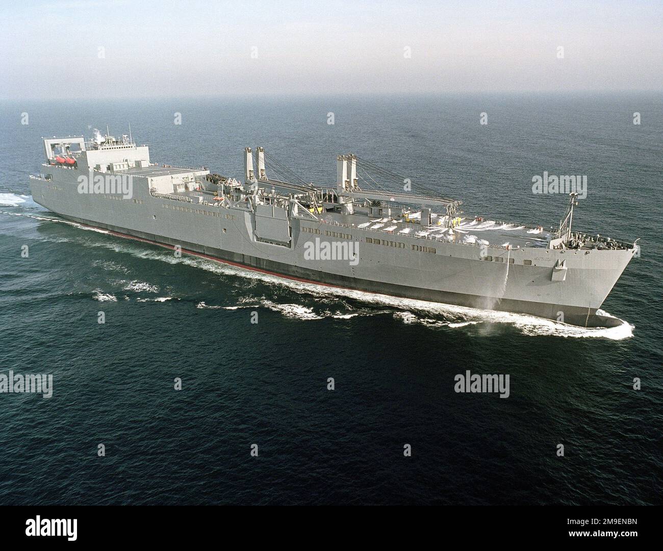 Low oblique starboard bow view of the Military Sealift Command (MSC) strategic heavy lift ship ...