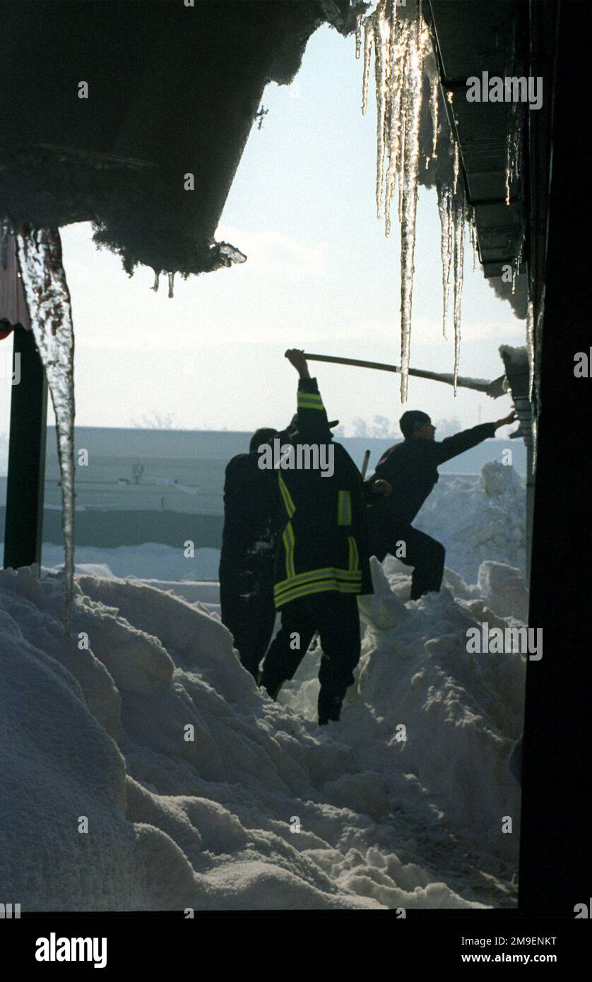 Straight on rear view medium shot as multinational firefighters ...