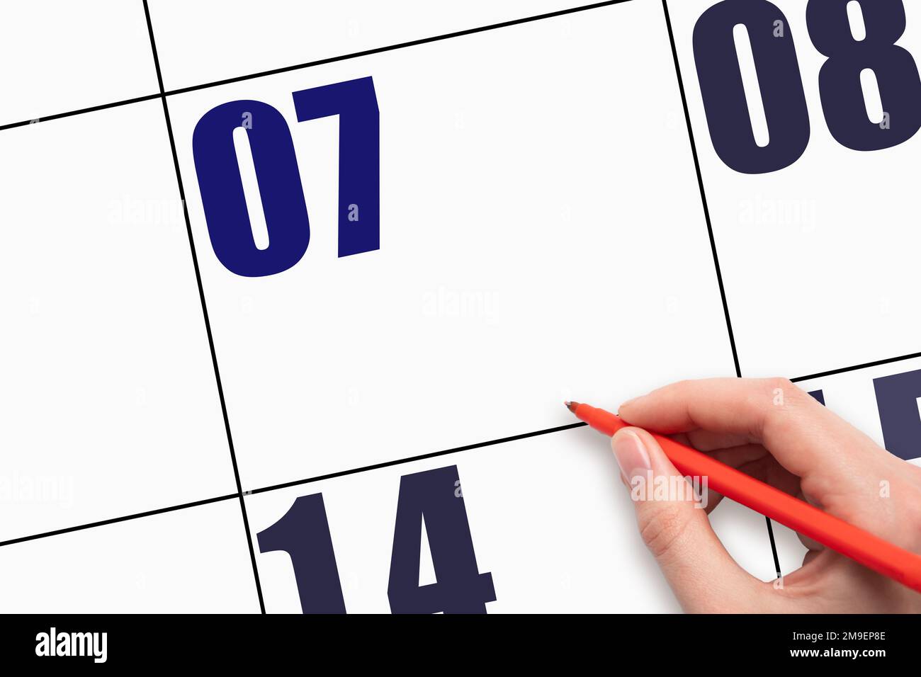 7th day of the month. Hand holding the red pen points to an empty ...