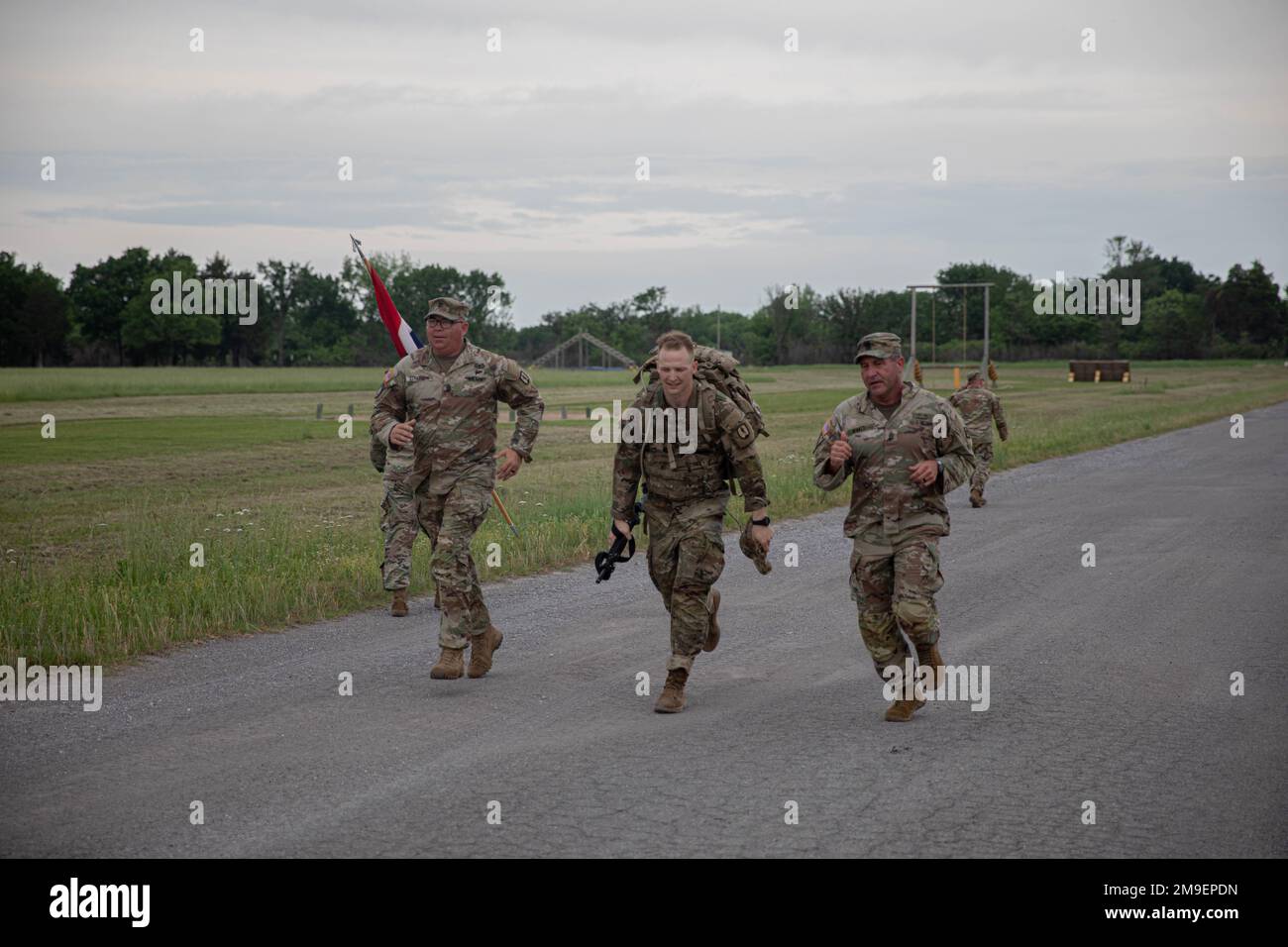 Staff. Sgt. Joseph Dunn, Arkansas National Guard, runs the final ...