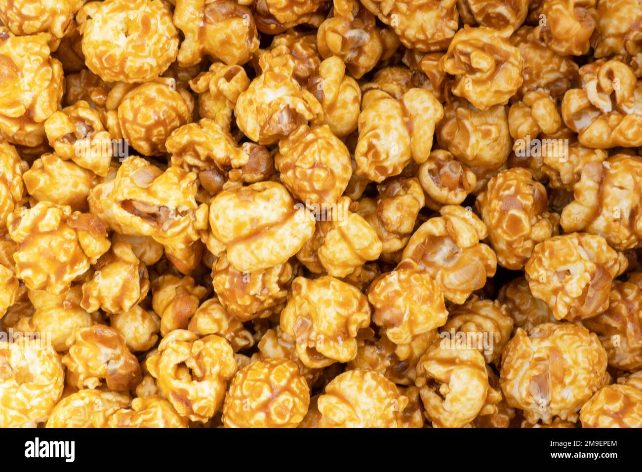 Caramel popcorn background texture. Popcorn pattern. Heap of delicious ...