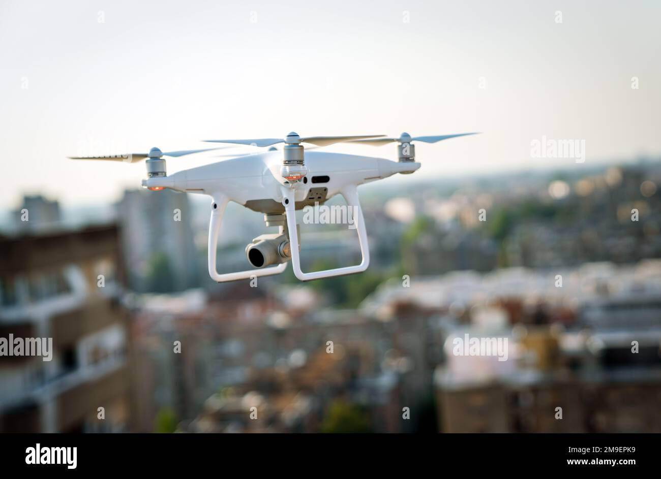 Drone with camera close up on the grey background. Preparation ...