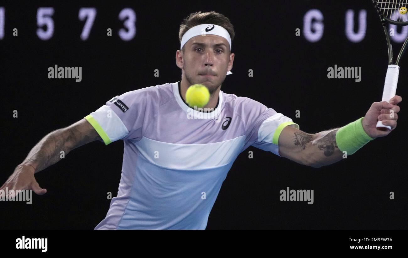 Alex Molcan of Slovakia plays a forehand return to Felix Auger-Aliassime of Canada during their ...