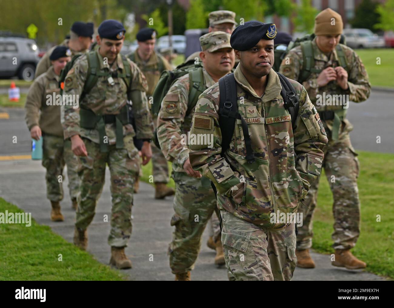 U.S. Airmen with the 627th Security Forces Squadron participate in a five-mile ruck in honor of ...