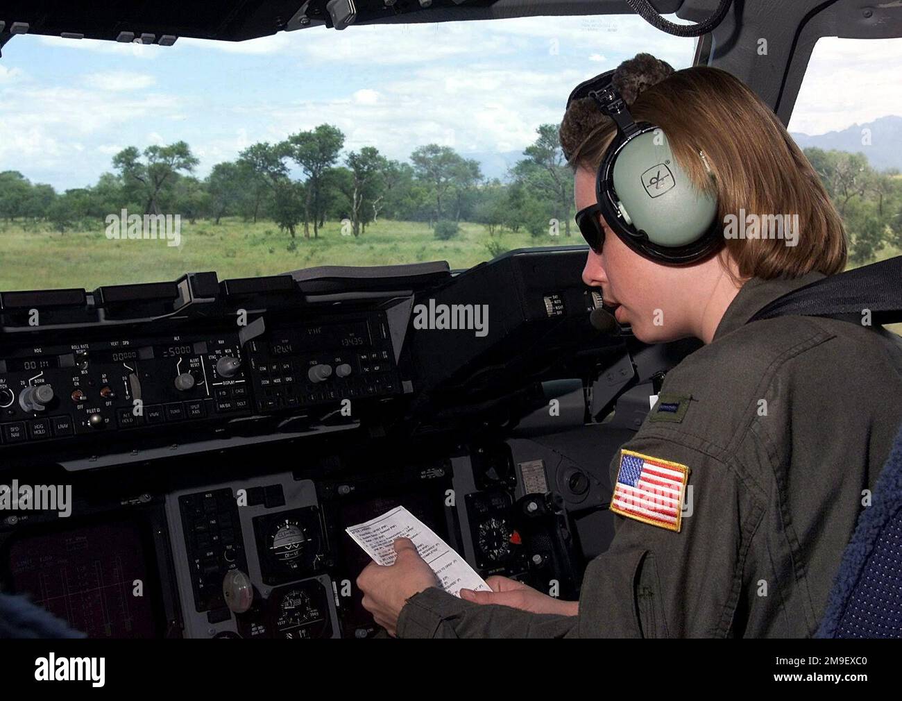 An interior over the left shoulder medium close-up shot as First ...