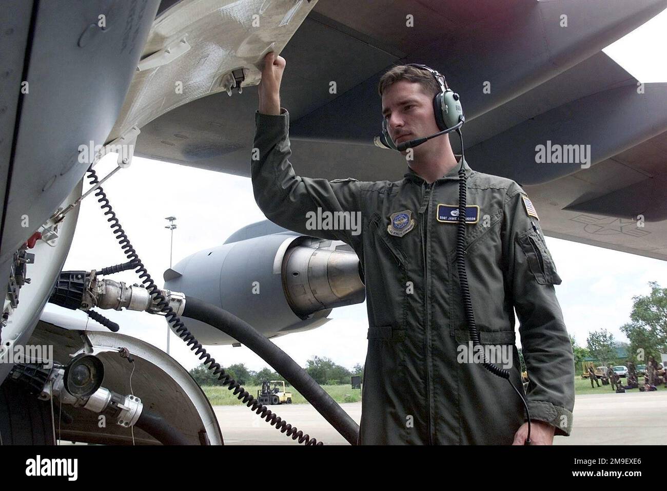 Straight on medium shot as STAFF Sergeant Richardson, a crew chief ...