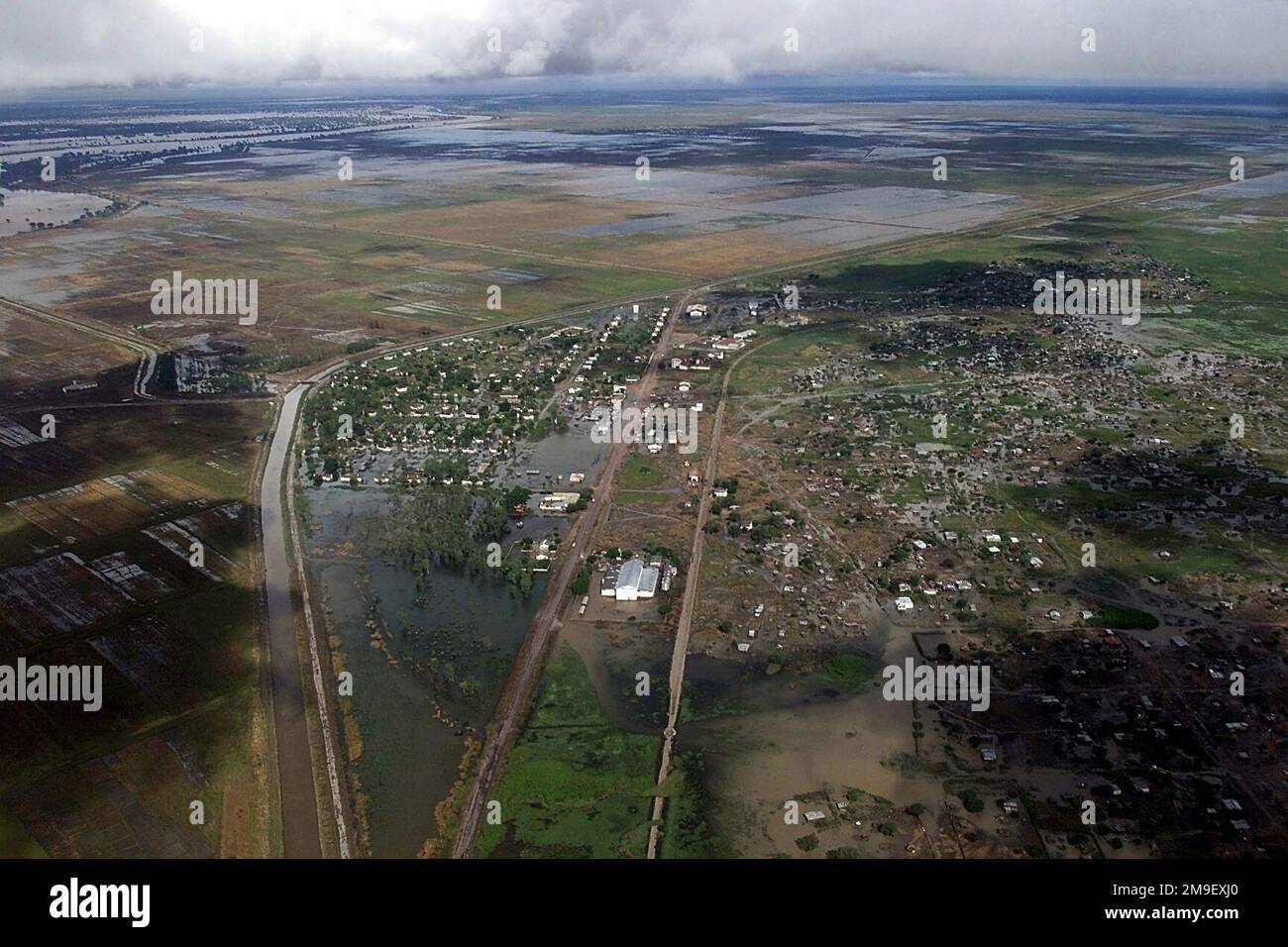 Aerial view, extreme long shot, looking down as water fills the streets ...