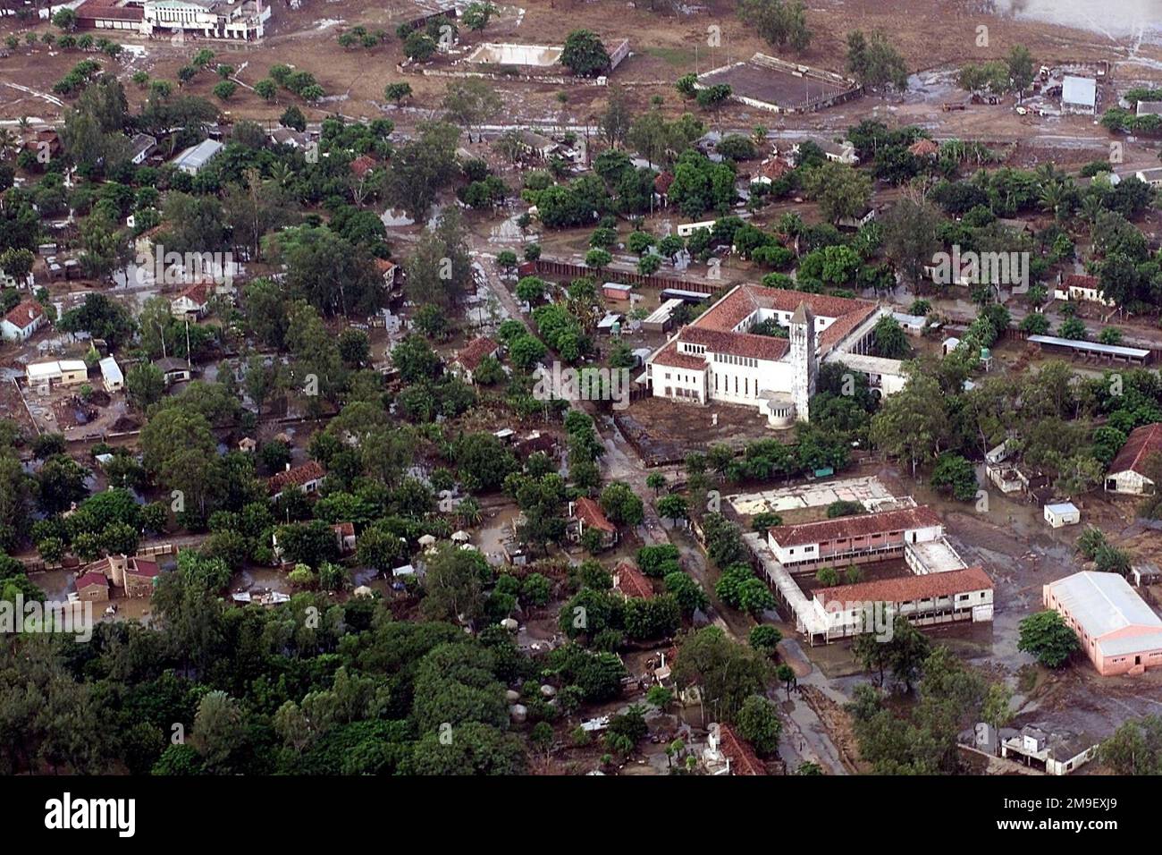 Aerial view, long shot, looking down as water fills the streets of the ...